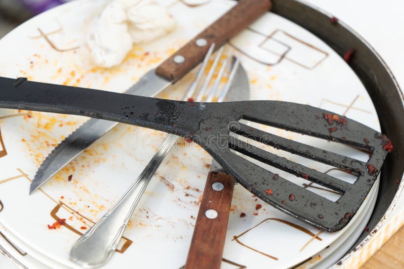 Dirty kitchen utensils stock photo. Image of spoon, home - 174250590