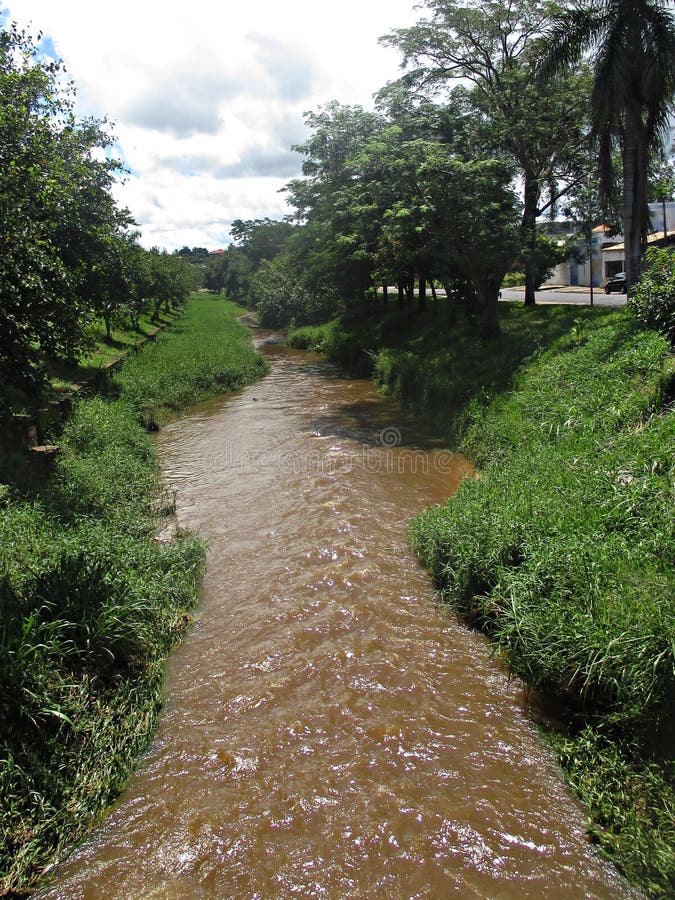 Dirty River in the City stock image. Image of blue, city - 156510555