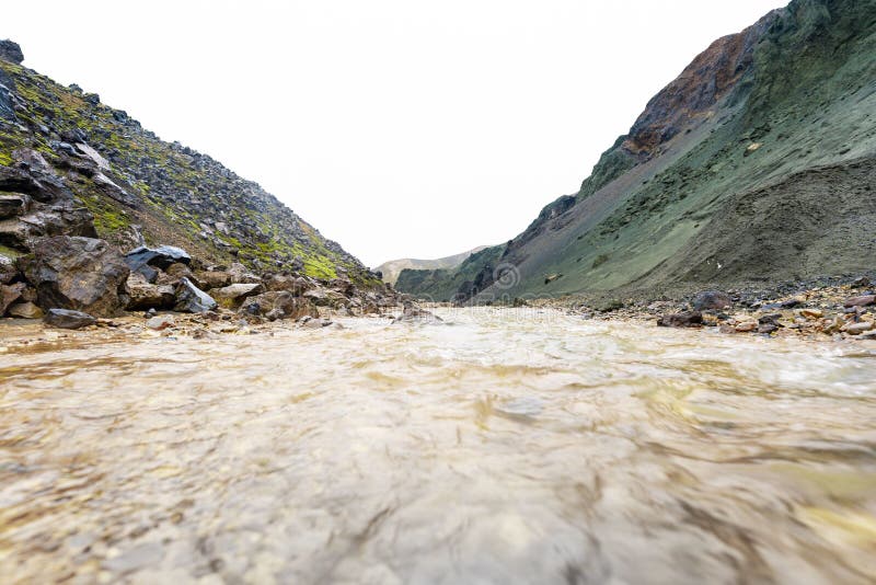 Dirty River Flowing between Mountains Stock Image - Image of rocks ...
