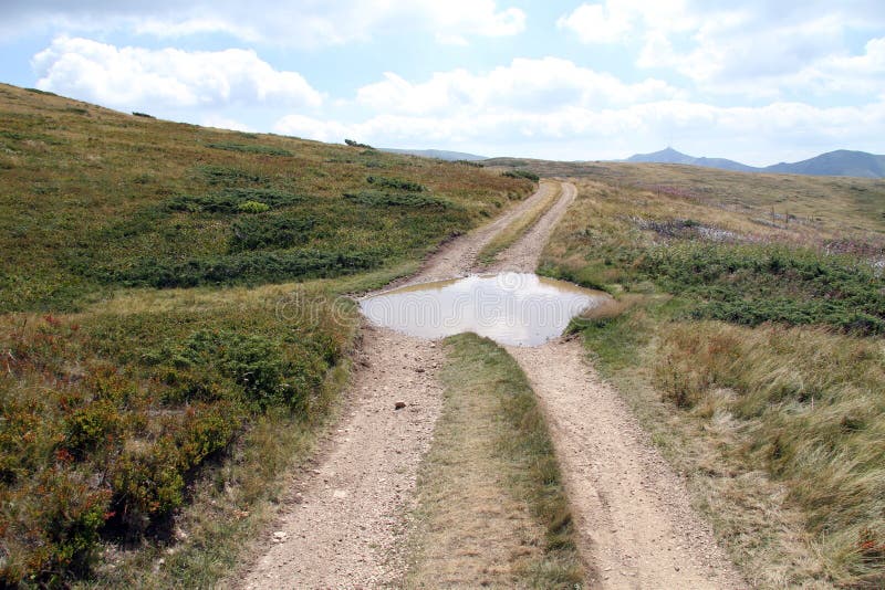Dirty road stock photo. Image of grass, europe, road - 26431172