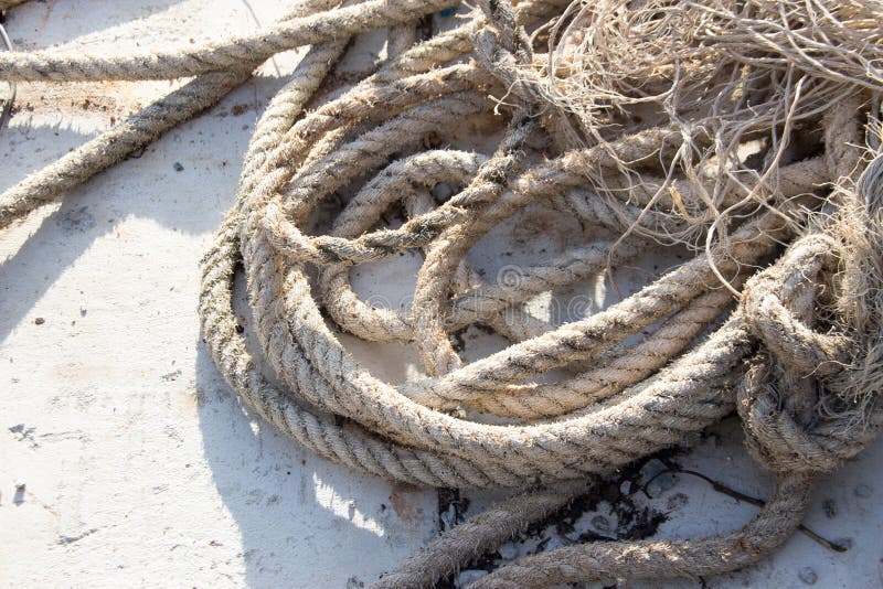 Dirty rope on ground stock photo. Image of ground, textile - 87431324