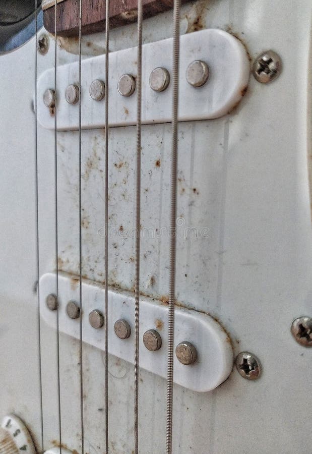 Dirty and Rusty Strings of a Guitar. Poor Looking Guitar. Old Guitar ...
