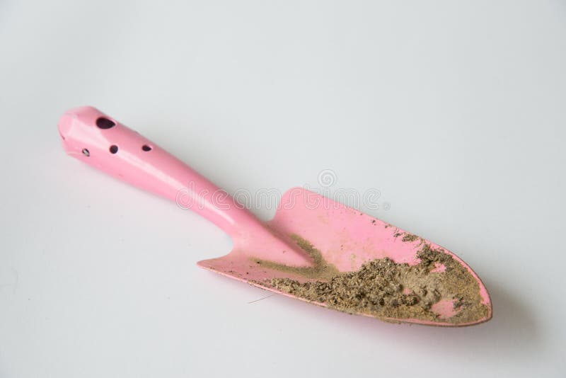 Dirty small pink shovel stock photo. Image of land, hand - 49075758