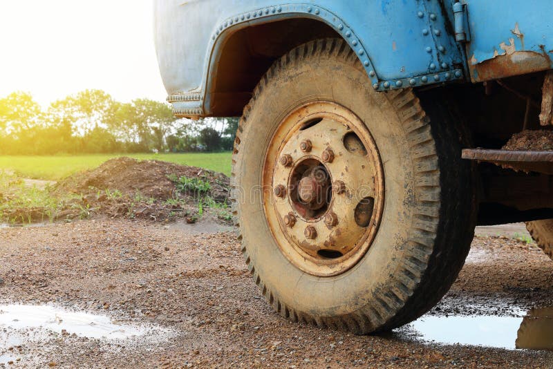 Dirty Truck Wheel on Ground Stock Photo - Image of grunge, iron: 94427122