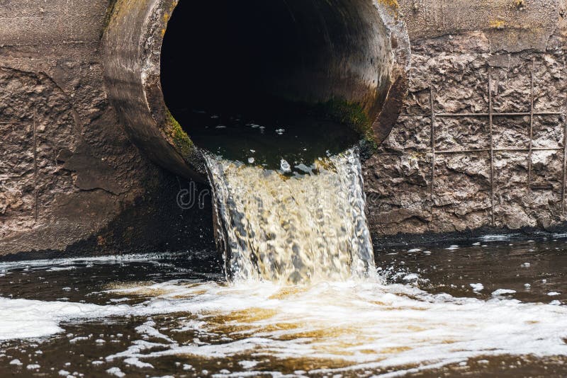 Dirty Water Flows from the Pipe into the River, Environmental Pollution ...