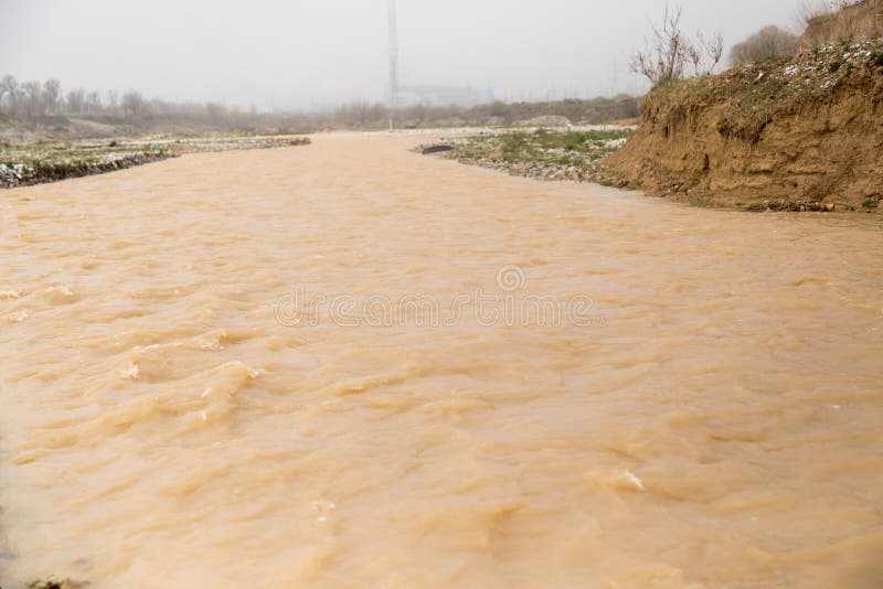 Dirty water in the river stock photo. Image of stormy - 95779958