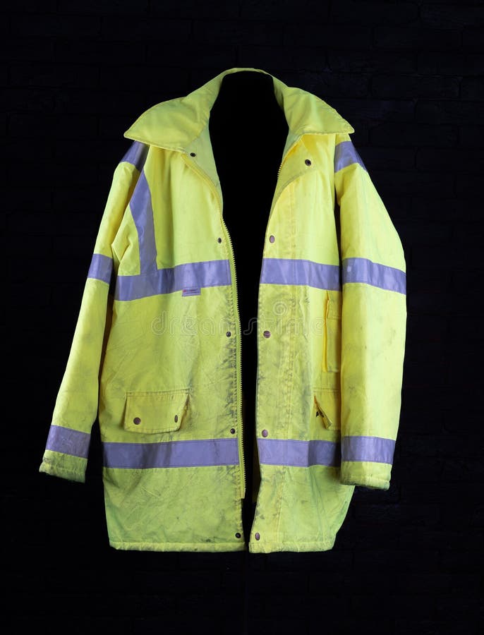 Dirty Work Yellow Jacket on Black Stock Image - Image of uniform ...