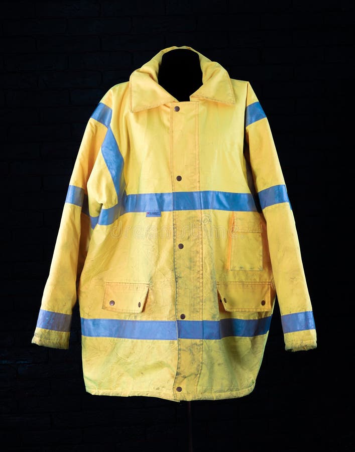Dirty Work Yellow Jacket on Black Stock Image - Image of yellow, safety ...