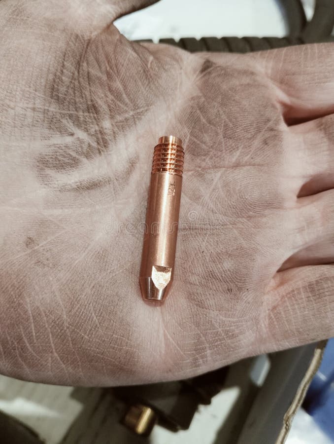 Dirty Workshop Hand with a Spare Part of a Welding Torch Stock Image ...