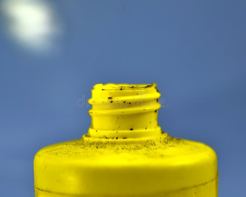 Dirty Yellow Chemical Bottle, Pollution Concept Stock Photo - Image of ...