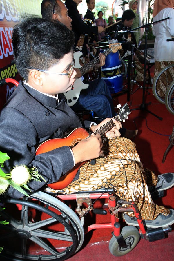 Disabilities play music editorial image. Image of java - 46428845