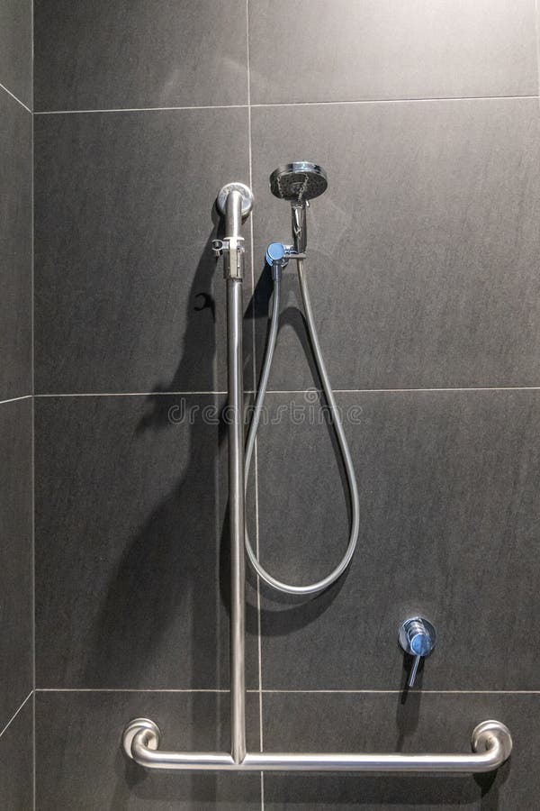 Disability Friendly Generic Restroom with Hand Rails Next To Shower ...