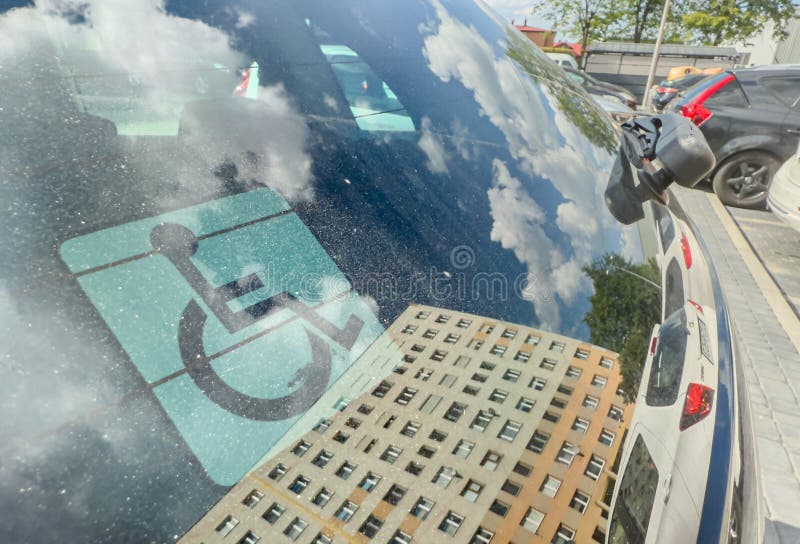 Visible Disability Placard Placed Behind a Car Windshield. Sign ...