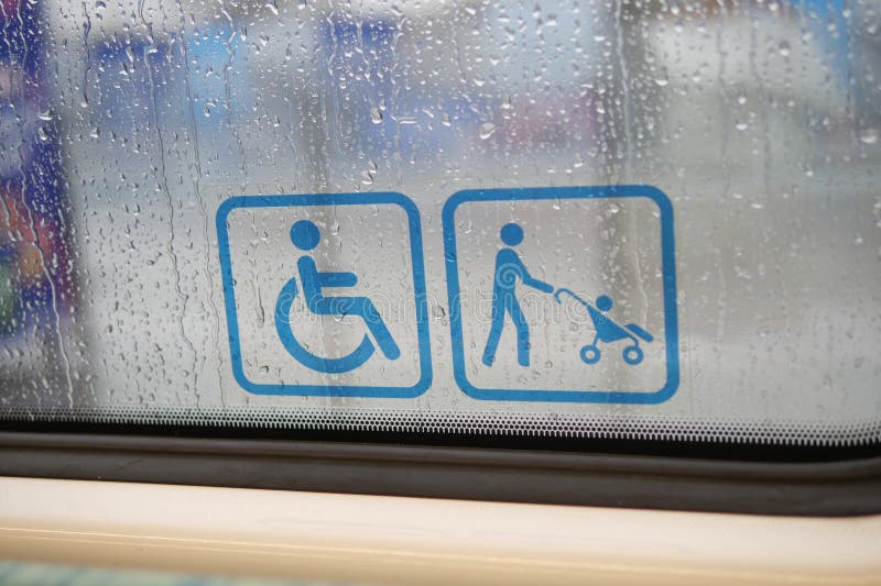 Disability Sign on the Door of a Subway Car Stock Photo - Image of ...