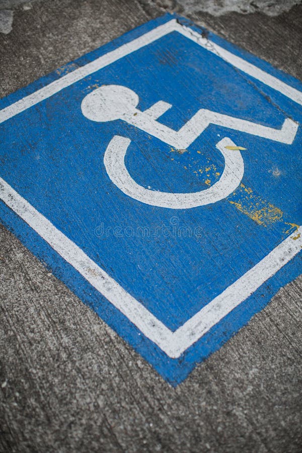 A Disable Sign on a Street. Stock Image - Image of reserved, road ...