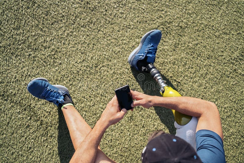 Disabled Athlete Sitting Using Phone Stock Image - Image of prosthetic ...