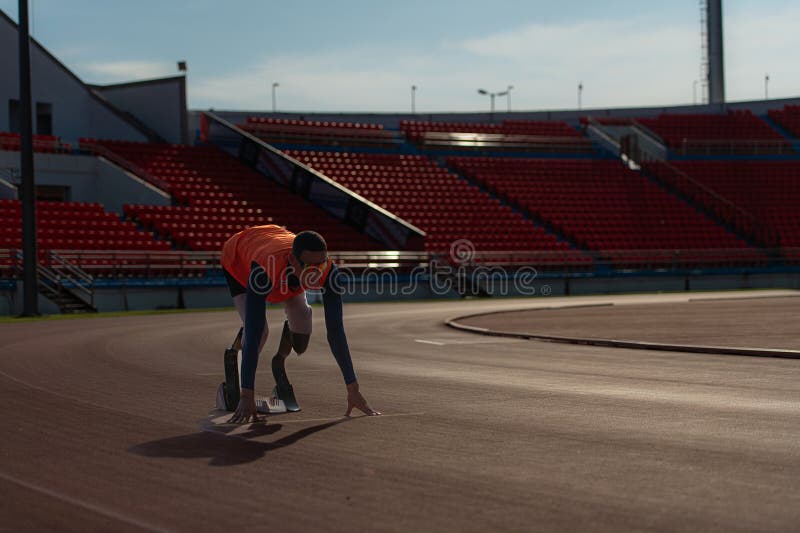 Disabled Athletes Prepare in Starting Position Ready To Run Stock Photo ...