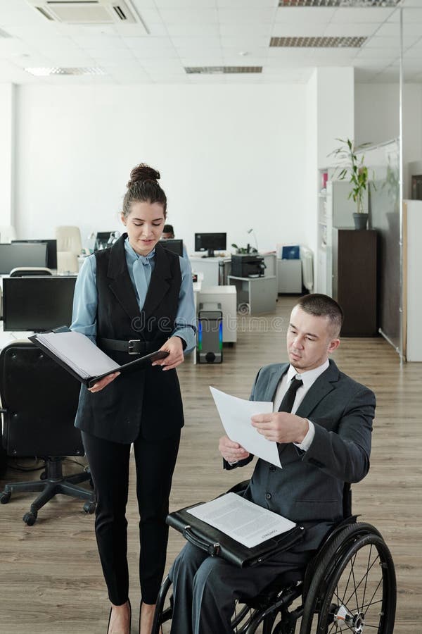 Disabled Boss and His Secretary Discussing New Contract Stock Photo ...