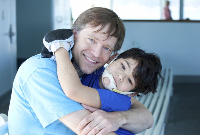 Disabled Boy Giving Father a Big Hug Stock Image - Image of mixed, race ...