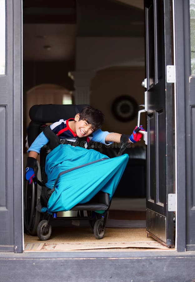 Disabled Boy in Wheelchair Opening Front Door Stock Photo - Image of ...