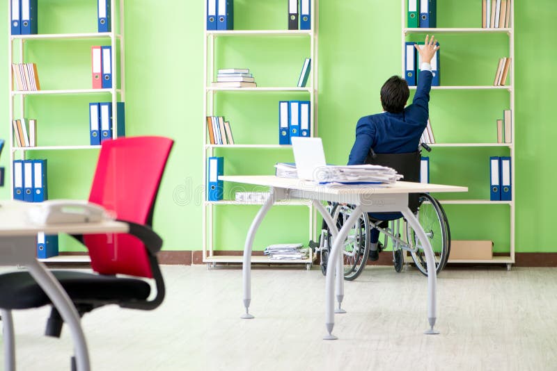 The Disabled Businessman Working in the Office Stock Image - Image of ...