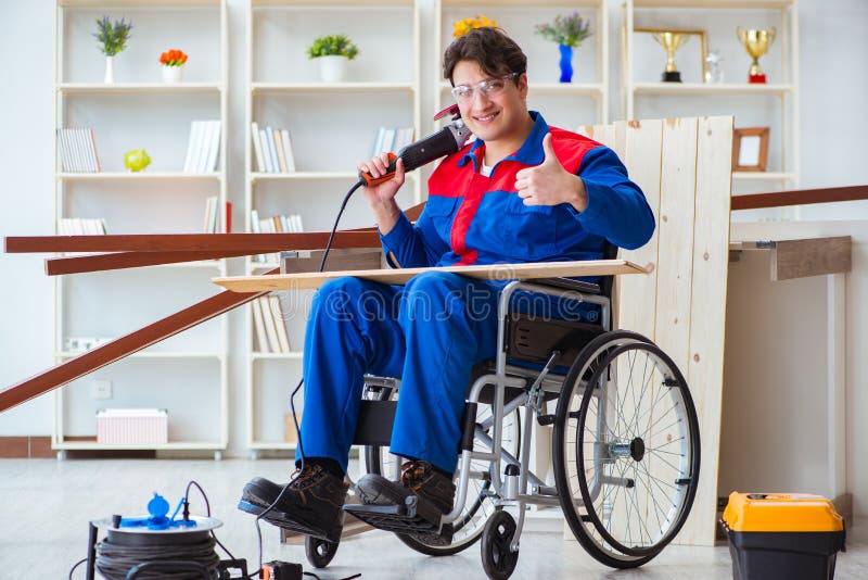 The Disabled Carpenter Working with Tools in Workshop Stock Photo ...