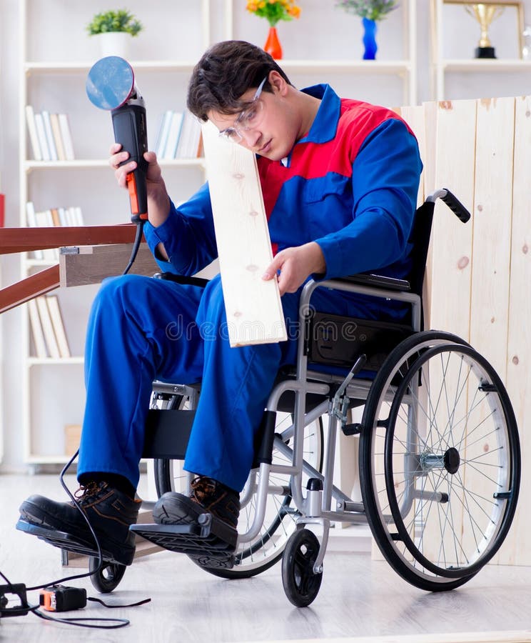 Disabled Carpenter Working with Tools in Workshop Stock Image - Image ...
