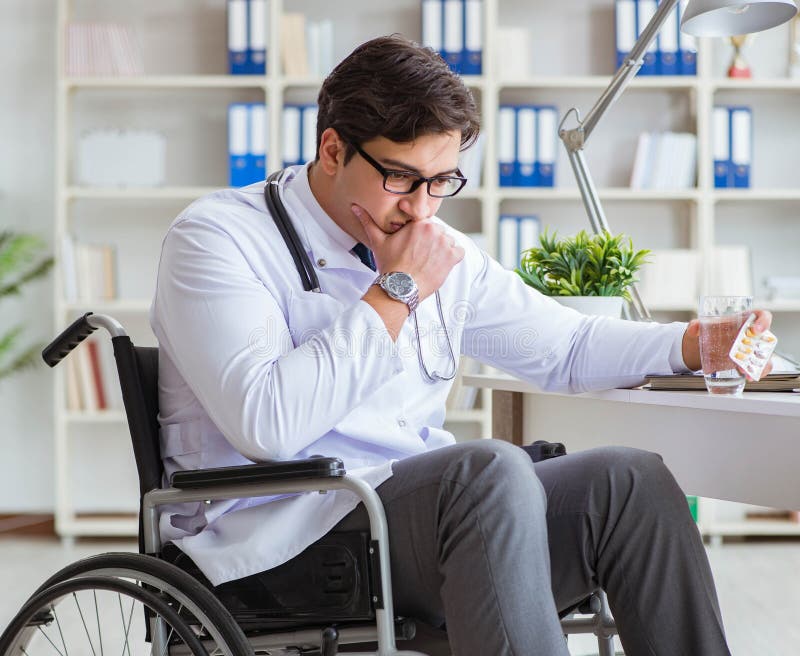 Disabled Doctor on Wheelchair Working in Hospital Stock Photo - Image ...