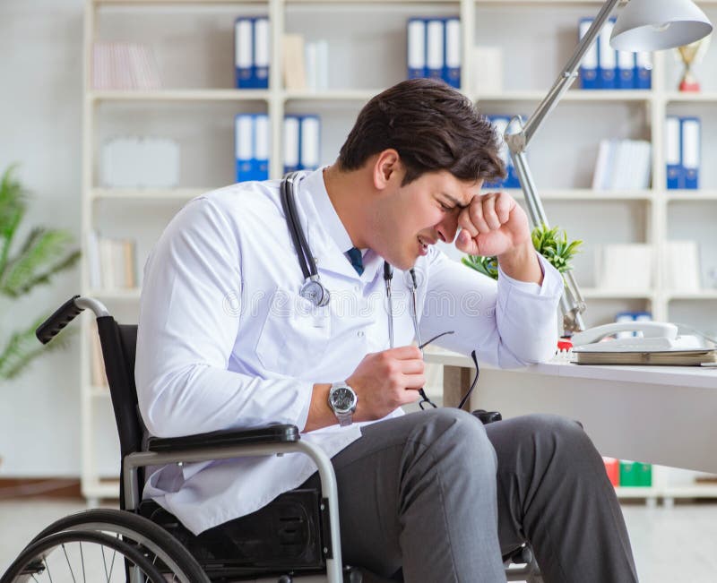 Disabled Doctor on Wheelchair Working in Hospital Stock Image - Image ...