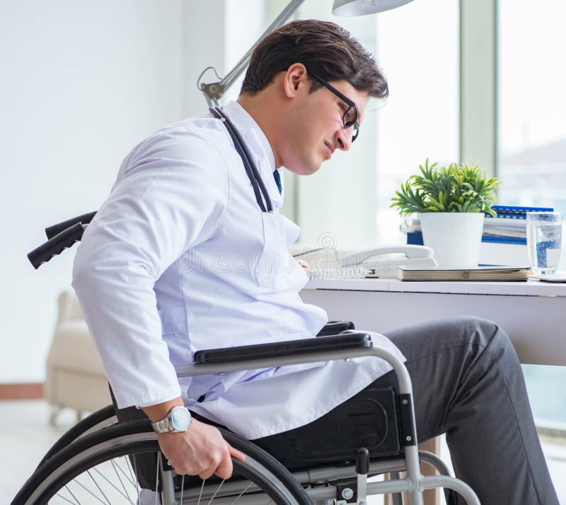 The Disabled Doctor On Wheelchair Working In Hospital Stock Image ...