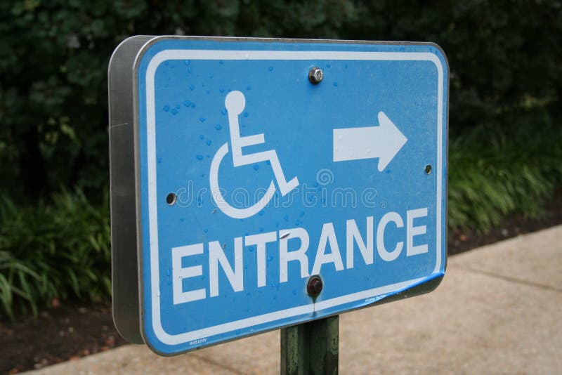 Disabled entrance sign stock photo. Image of pointing - 11026344