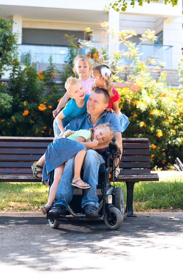 Disabled Father with Children Stock Image - Image of color, mobility ...