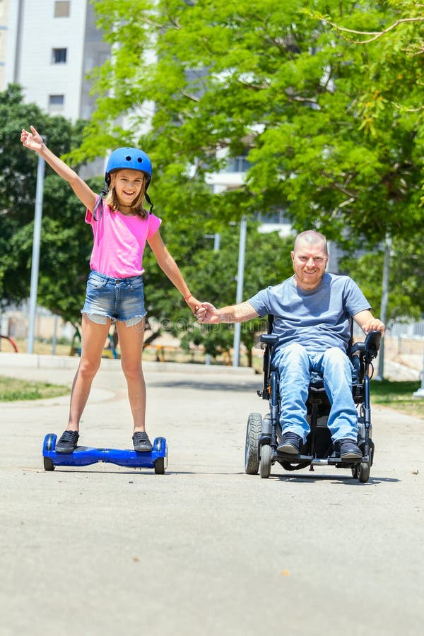 Disabled Father with His Daughter Faving Fun Stock Image - Image of ...