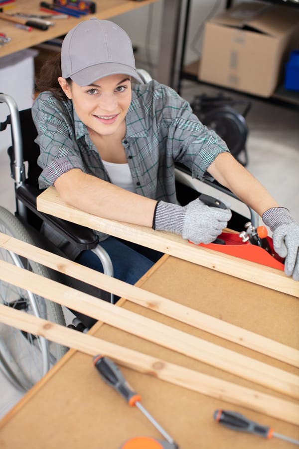Disabled Female Worker in Wheelchair in Carpenters Workshop Stock Image ...