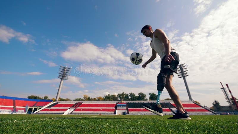 Disabled Footballer is Playing with a Ball Stock Video - Video of ...