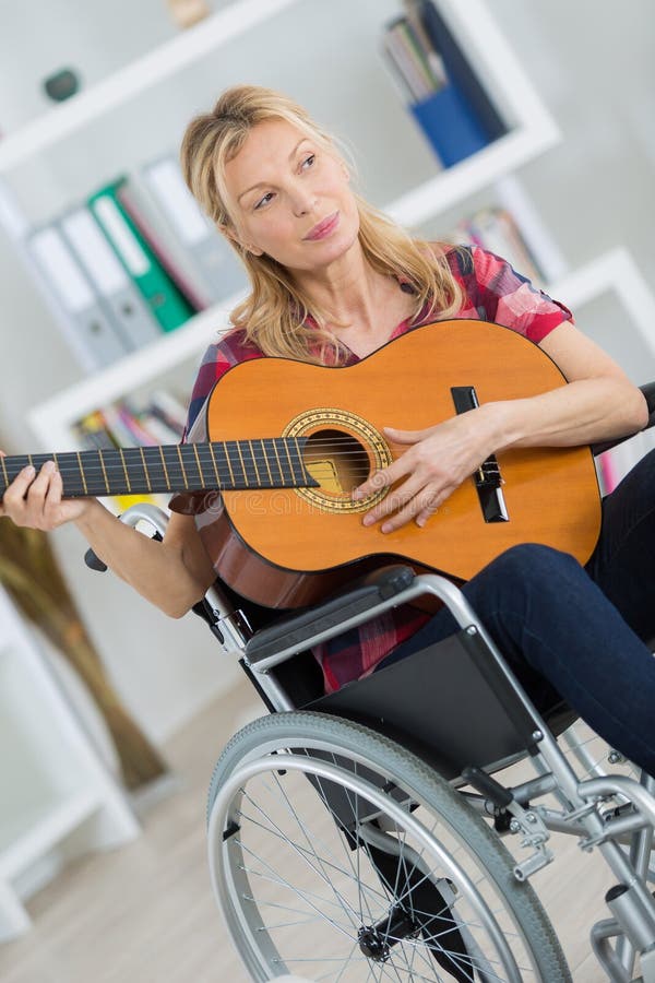 Disabled Lady Playing Guitar Stock Photo - Image of wheel, leisure ...