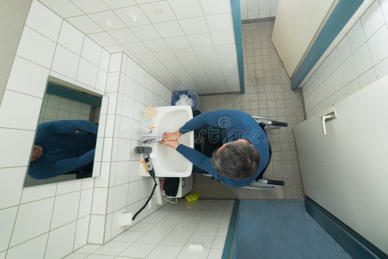 Disabled Man in Bathroom Washing Hands Stock Photo - Image of hygiene ...
