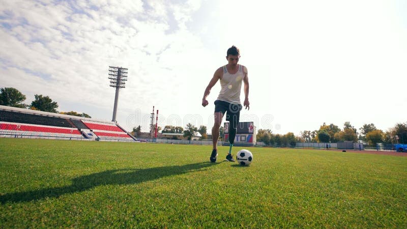 Disabled Man with a Bionic Leg is Playing Football Stock Video - Video ...