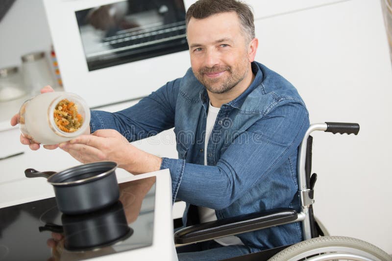 Disabled Man Cooking Pasta at Home Stock Image - Image of handicapped ...