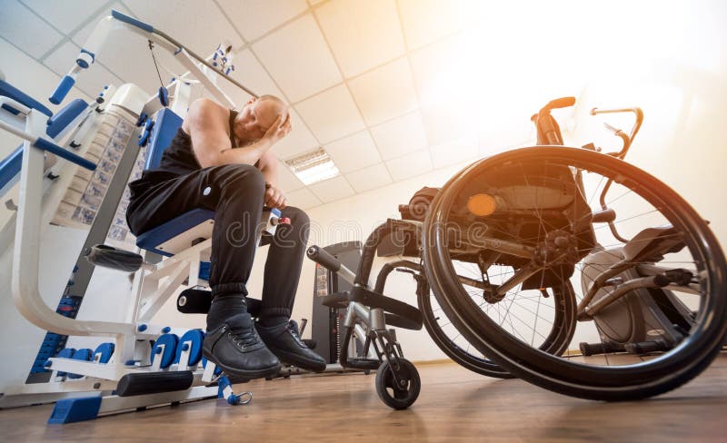 Disabled Man Doing Strength Exercises Separate from the Wheelchair ...