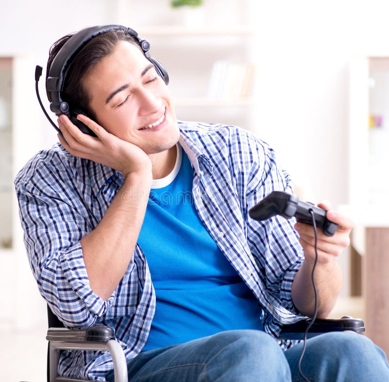 Disabled Man Playing Computer Games during Rehabilitation Stock Photo ...