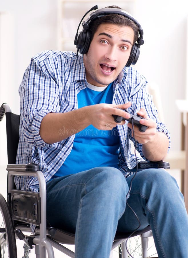 Disabled Man Playing Computer Games during Rehabilitation Stock Photo ...