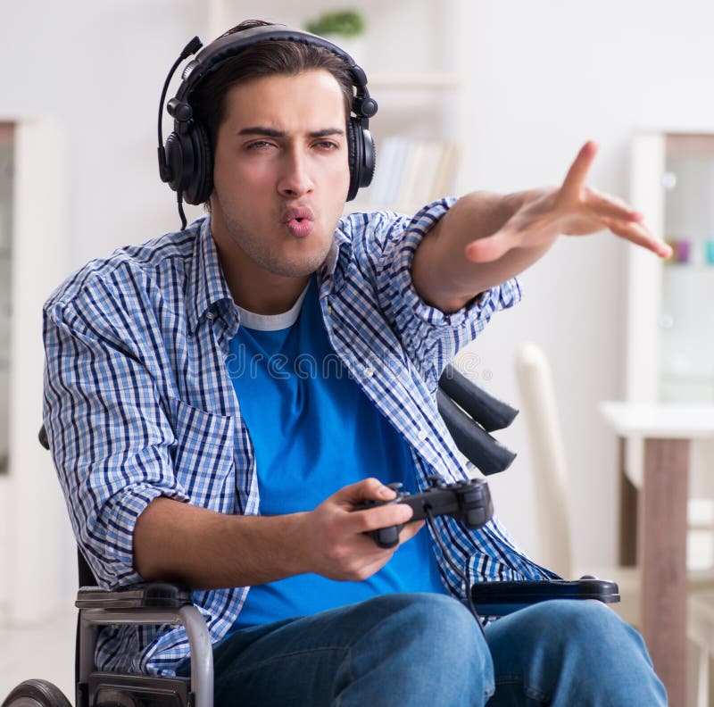Disabled Man Playing Computer Games during Rehabilitation Stock Photo ...