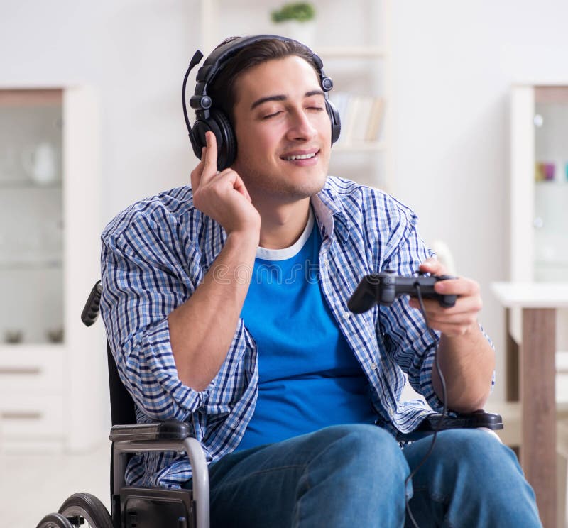 Disabled Man Playing Computer Games during Rehabilitation Stock Photo ...