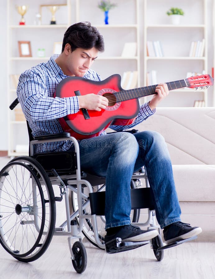 Disabled Man Playing Guitar at Home Stock Photo - Image of handicapped ...