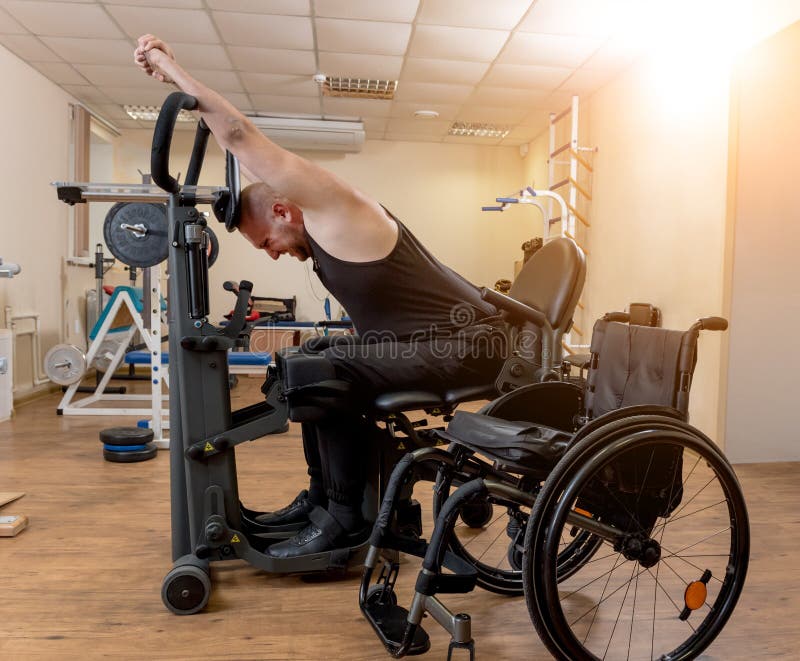 Disabled Man Training in the Gym. Rehabilitation Center Stock Photo ...