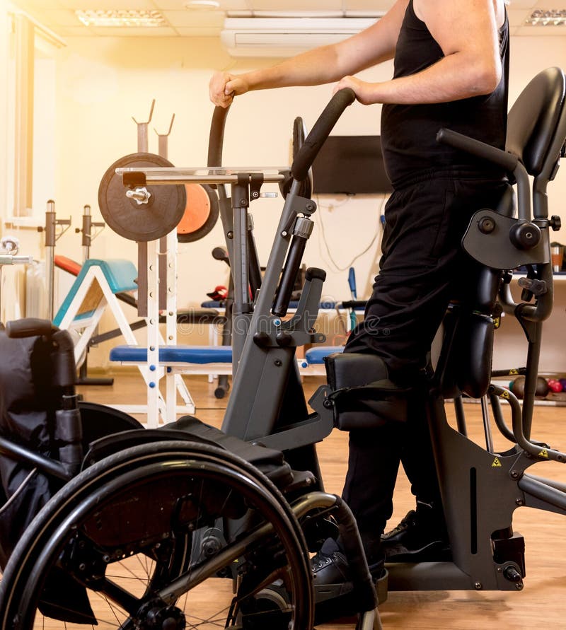Disabled Man Training in the Gym. Rehabilitation Center Stock Photo ...