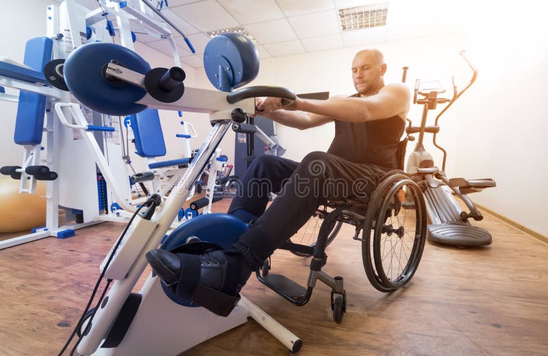 Disabled Man Training in the Gym. Rehabilitation Center Stock Image ...