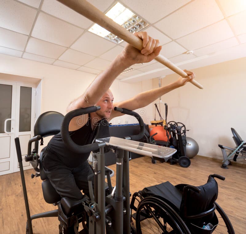 Disabled Man Training in the Gym. Rehabilitation Center Stock Photo ...