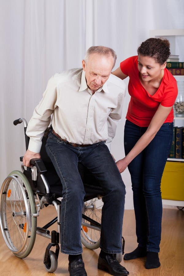 Disabled Man Trying To Stand Up Stock Image - Image of nurse ...
